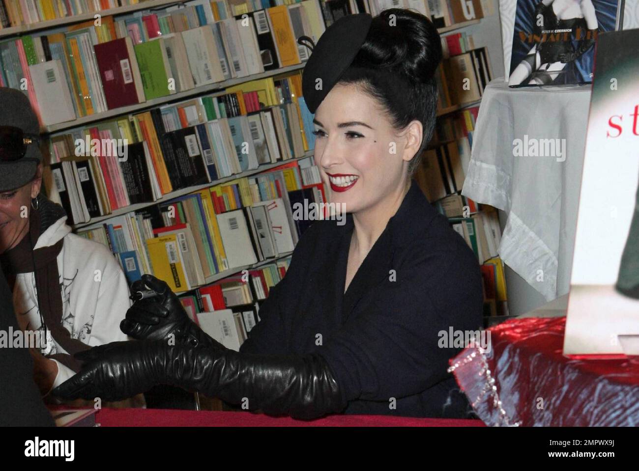 Burlesque star Dita Von Teese signs copies of her new book "Dita ...
