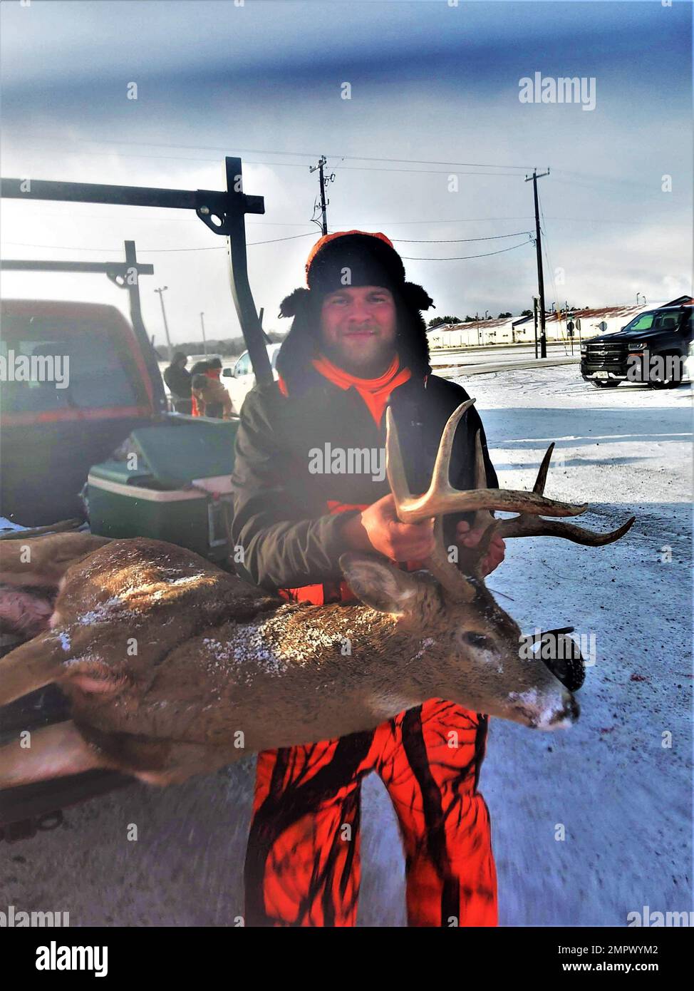 A hunter is shown with a deer Nov. 19, 2022, taken during the 2022 Fort ...