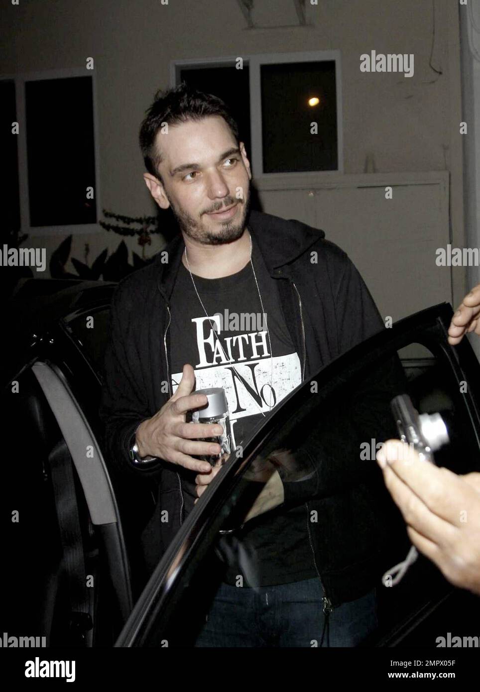 DJ AM leaves the nightclub Foxtail after spinning all night. He poses ...