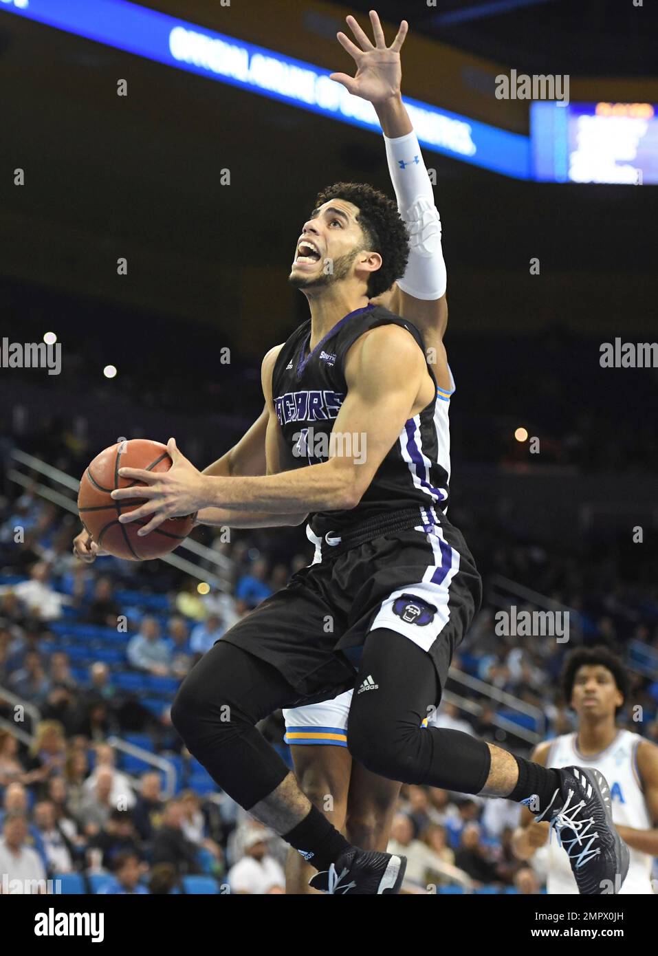 Central Arkansas guard Jordan Howard shoots against UCLA during an NCAA ...