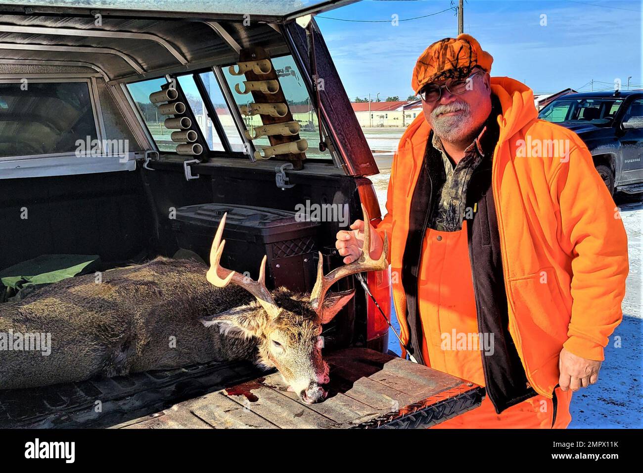 A hunter is shown with a deer Nov. 20, 2022, taken during the 2022 Fort ...