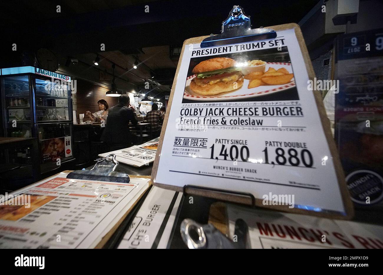 A menu showing U.S. President Donald Trump set is seen at Munch's ...