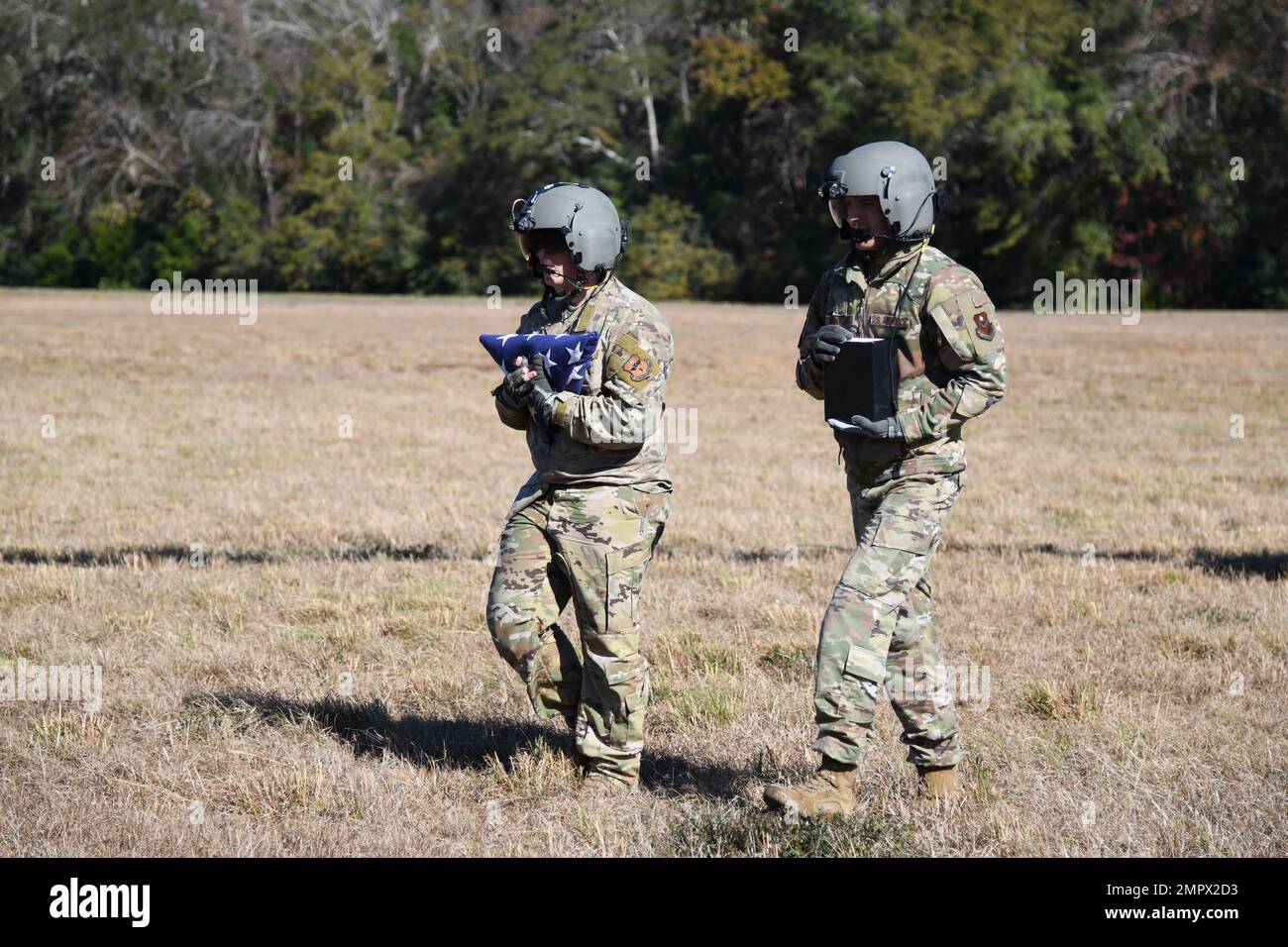 The 23d Flying Training Squadron, U.S. Air Force, delivers the remains ...