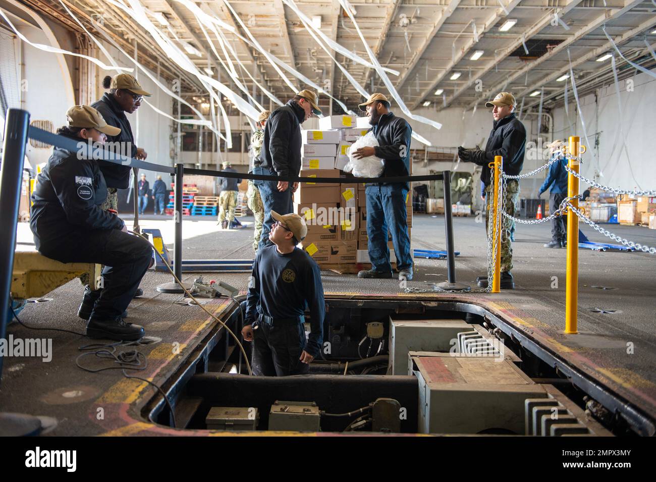 221121-N-ND021-1002 NORFOLK, Va. (Nov. 21, 2022) Sailors bring supplies ...