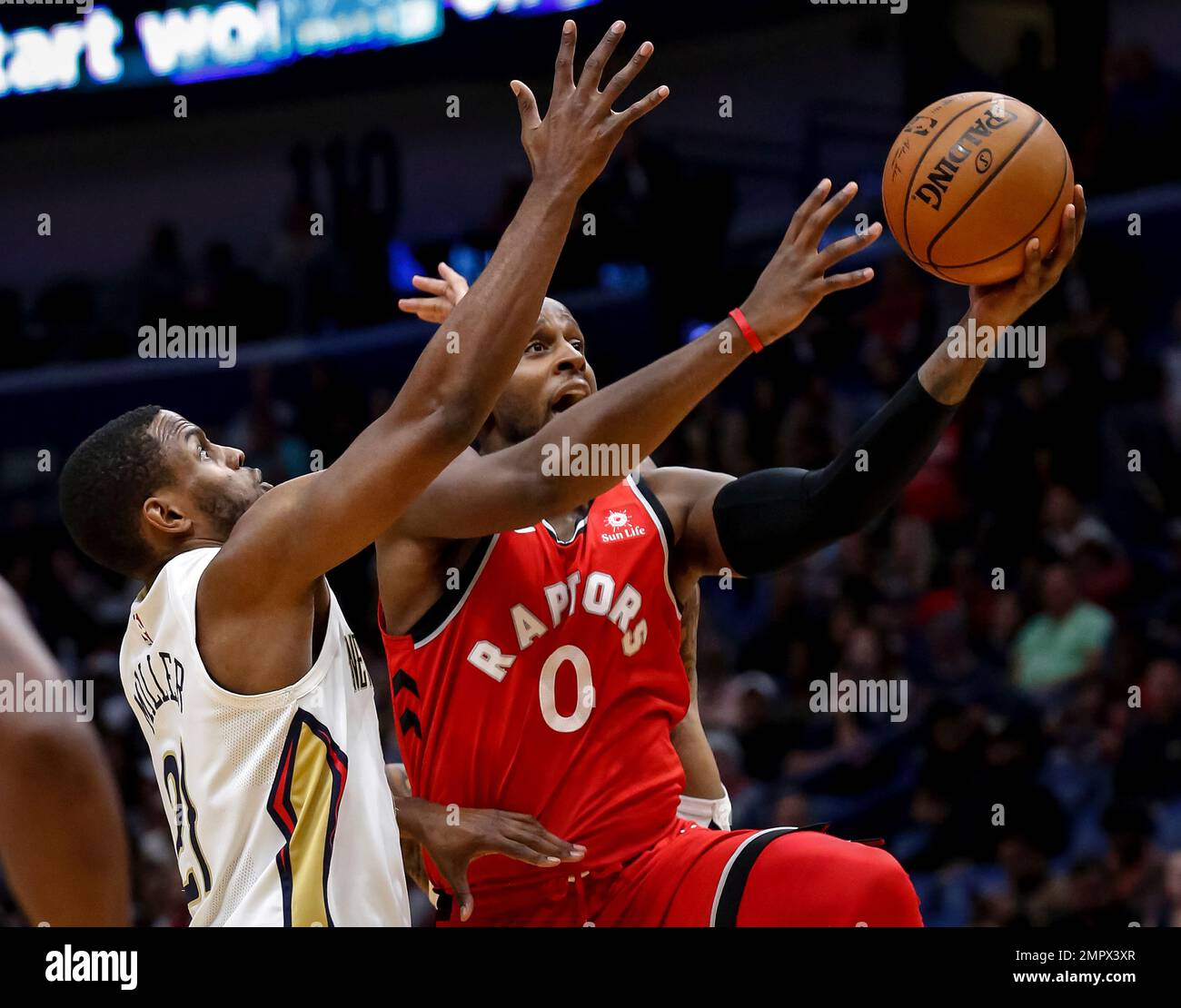 Toronto Raptors forward CJ Miles (0) shoots over New Orleans Pelicans ...