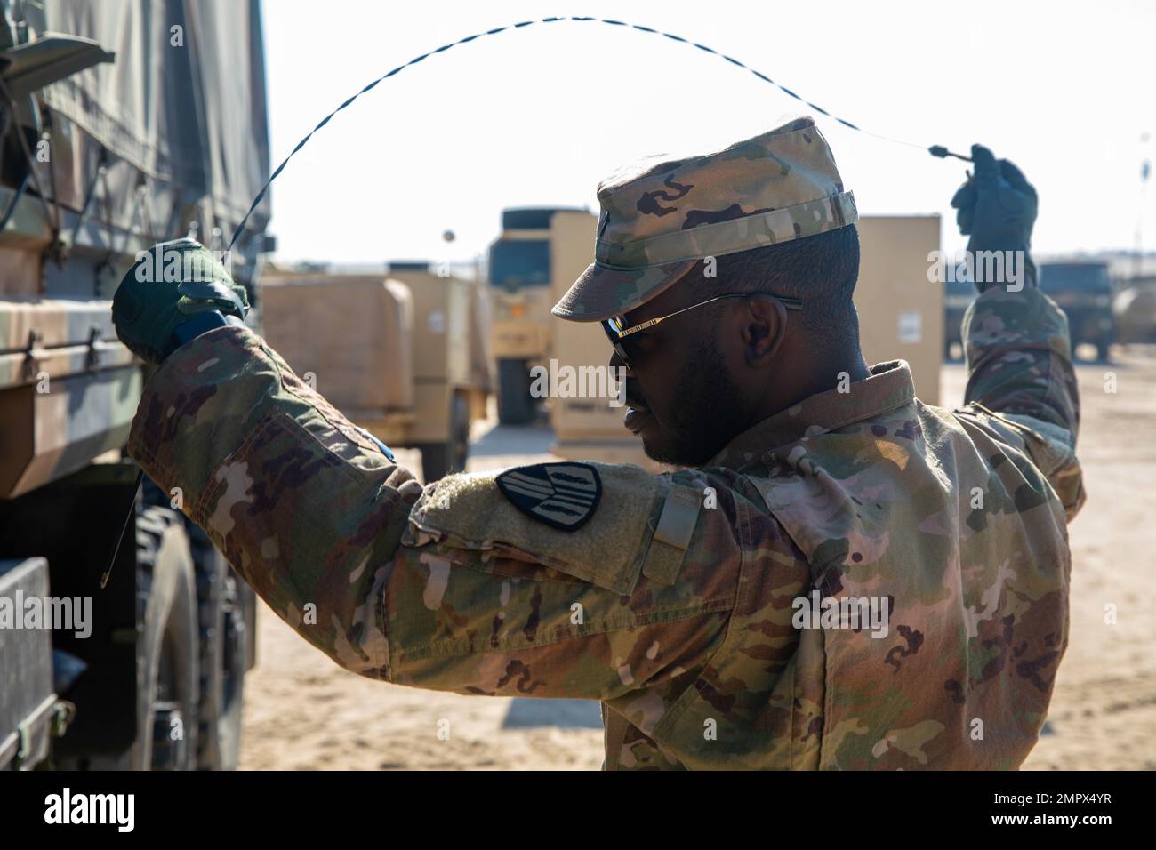 U.S. Army Spc. Rickardo Shuzzr, a human resources specialist with the ...
