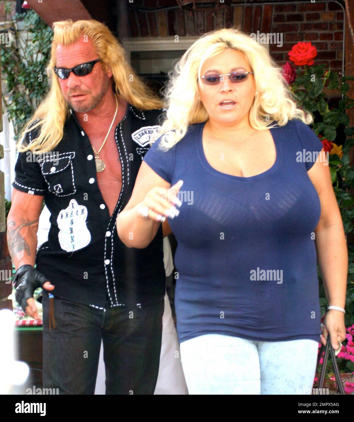 Dog the Bounty Hunter and wife Beth Smith Chapman leave The Ivy. West ...