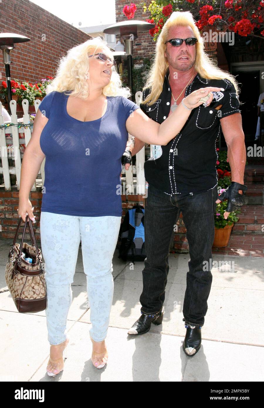 Dog the Bounty Hunter and wife Beth Smith Chapman leave The Ivy. West ...