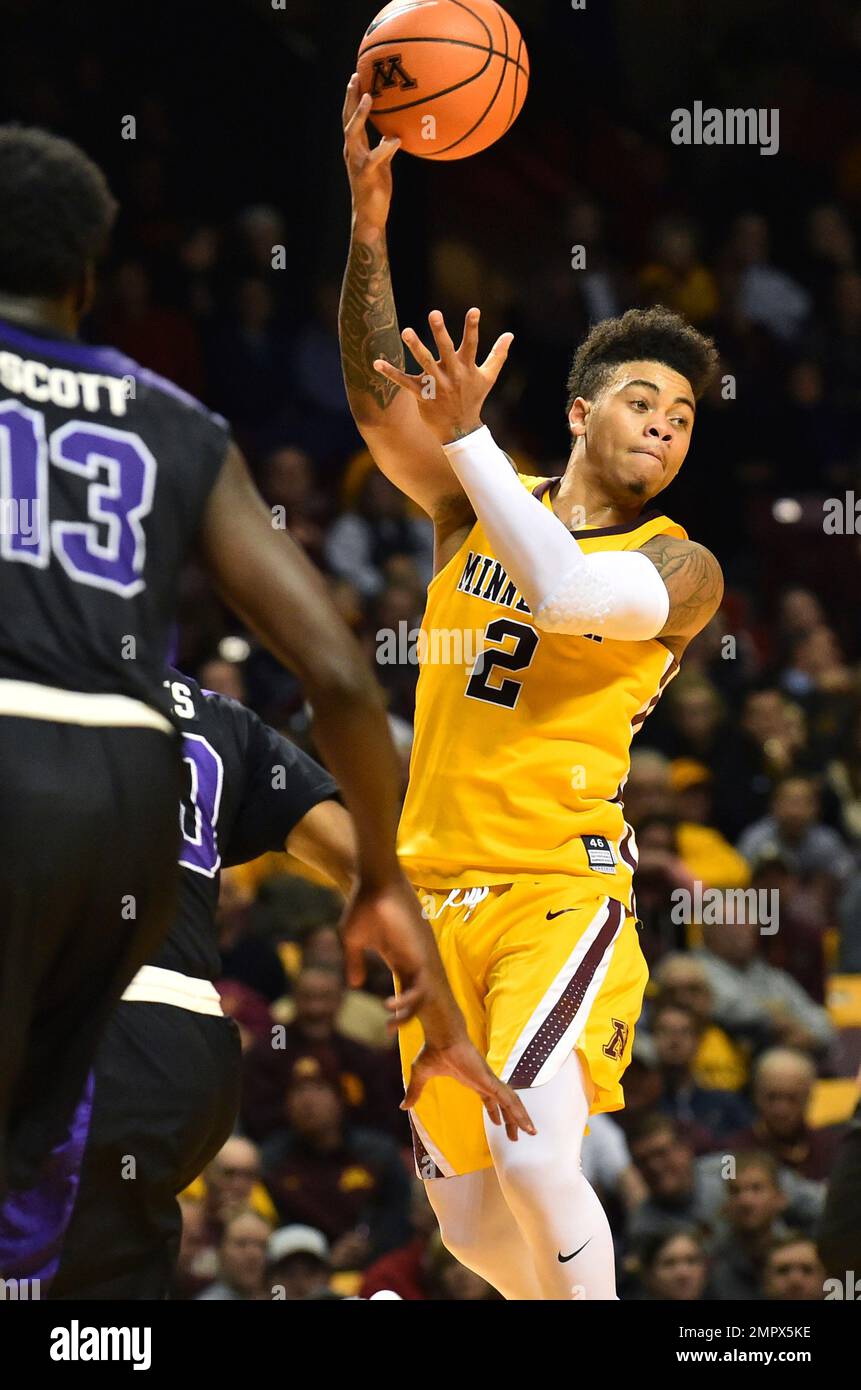 Minnesota guard Nate Mason pass the ball against Niagara during the ...