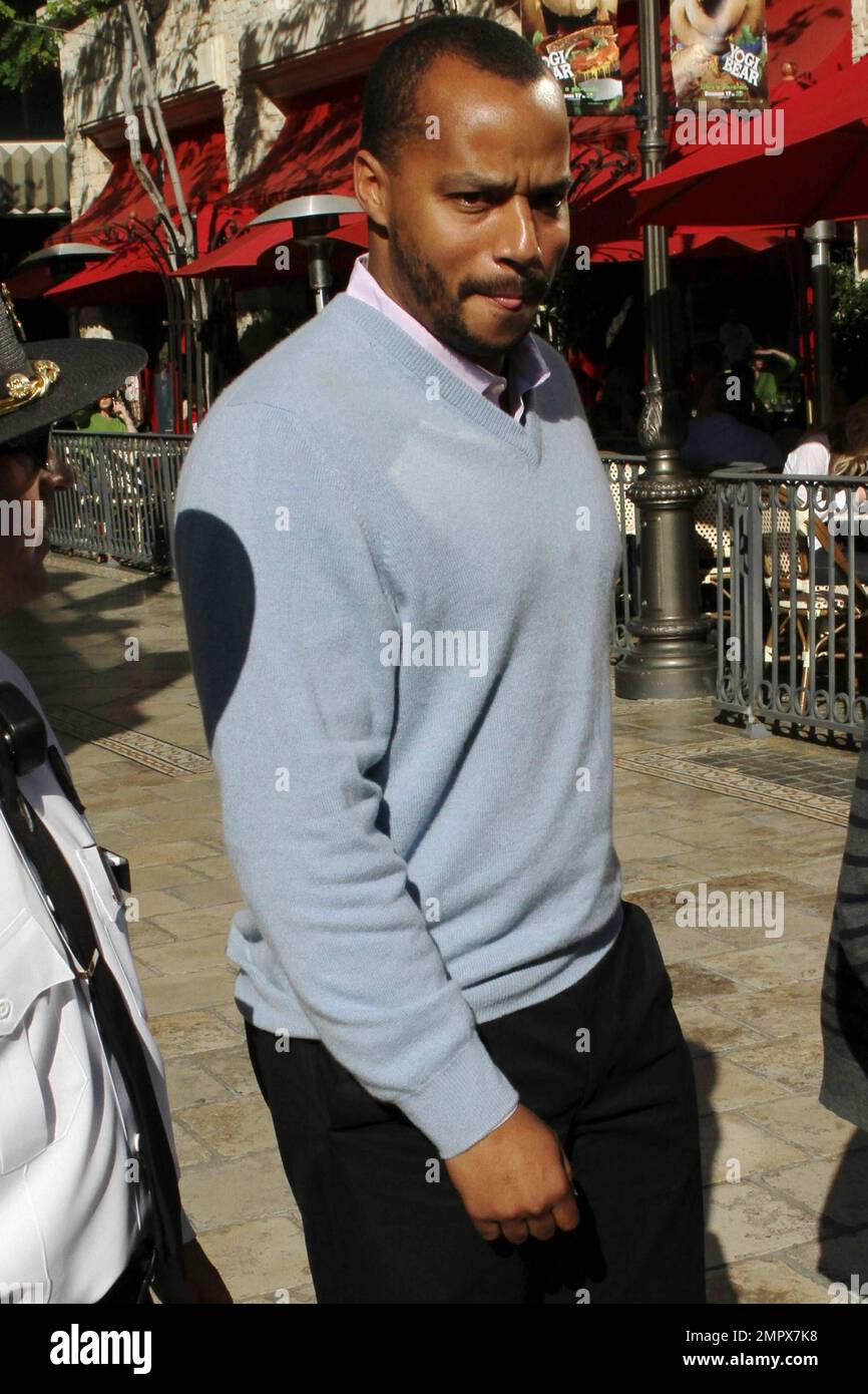 Actor Donald Faison does a small dance for photographers at the Grove ...
