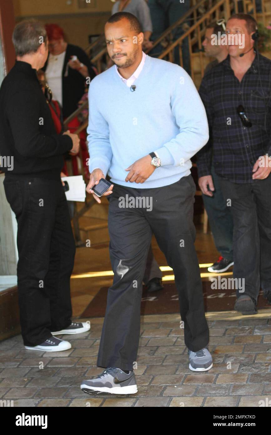 Actor Donald Faison does a small dance for photographers at the Grove ...