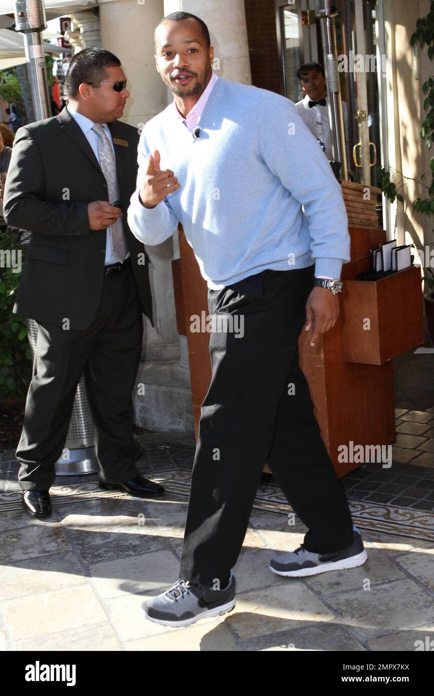 Actor Donald Faison does a small dance for photographers at the Grove ...