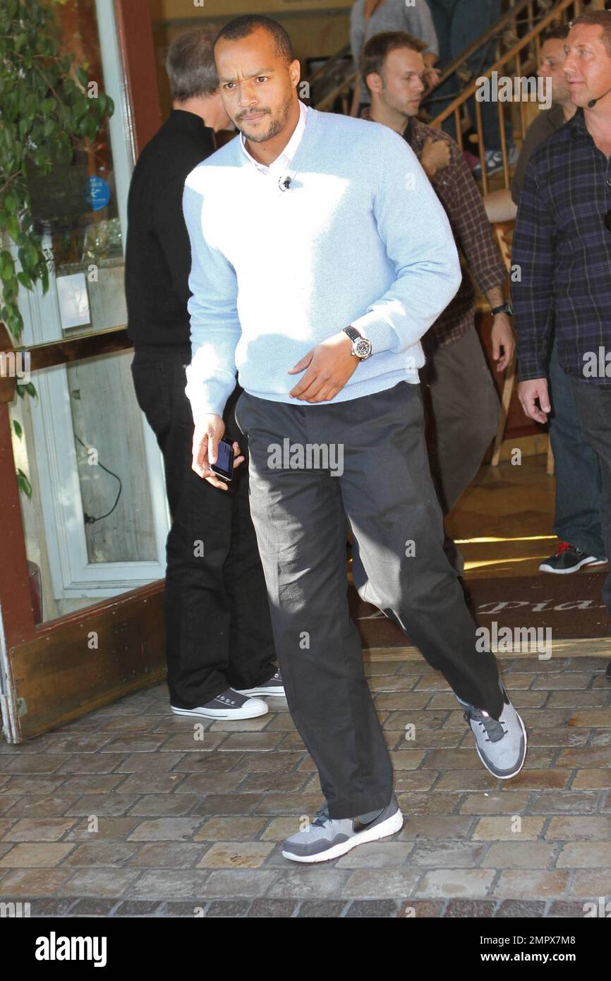 Actor Donald Faison does a small dance for photographers at the Grove ...