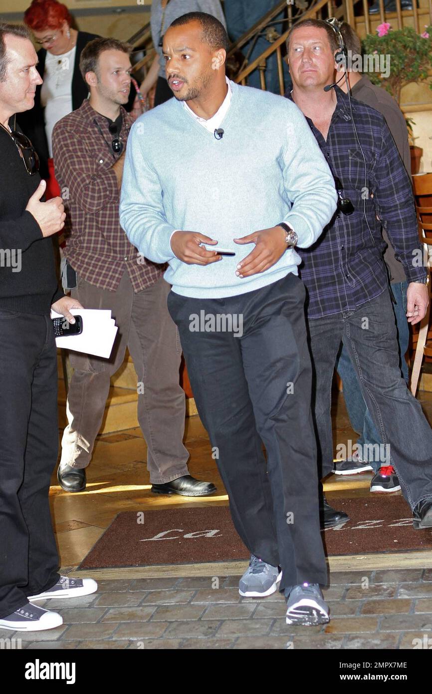 Actor Donald Faison does a small dance for photographers at the Grove ...