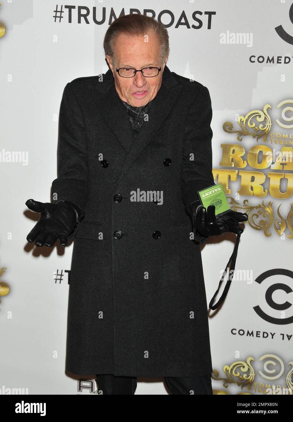 Larry King poses on the gold carpet at Comedy Central's Roast of Donald ...