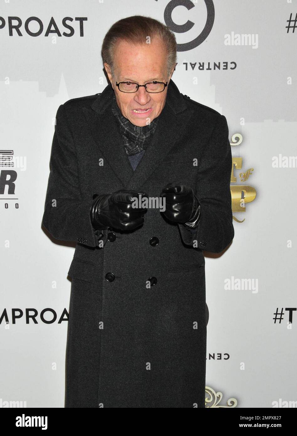 Larry King poses on the gold carpet at Comedy Central's Roast of Donald ...
