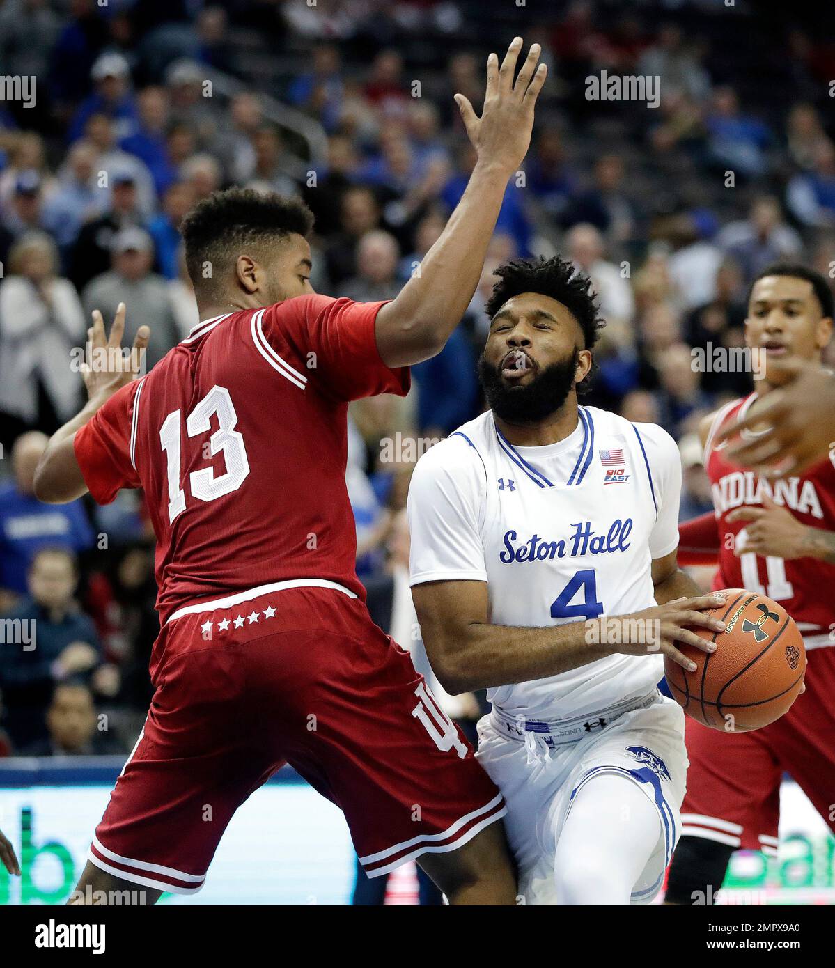 Seton Hall guard Eron Gordon (4) tires to go for a shot against Indiana ...