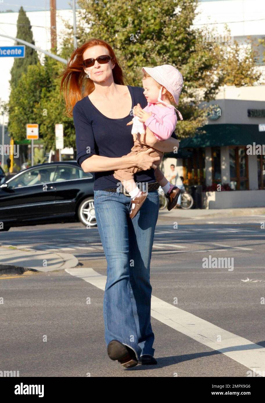 Doting mom "Desperate Housewives" star Marcia Cross strolls in ...