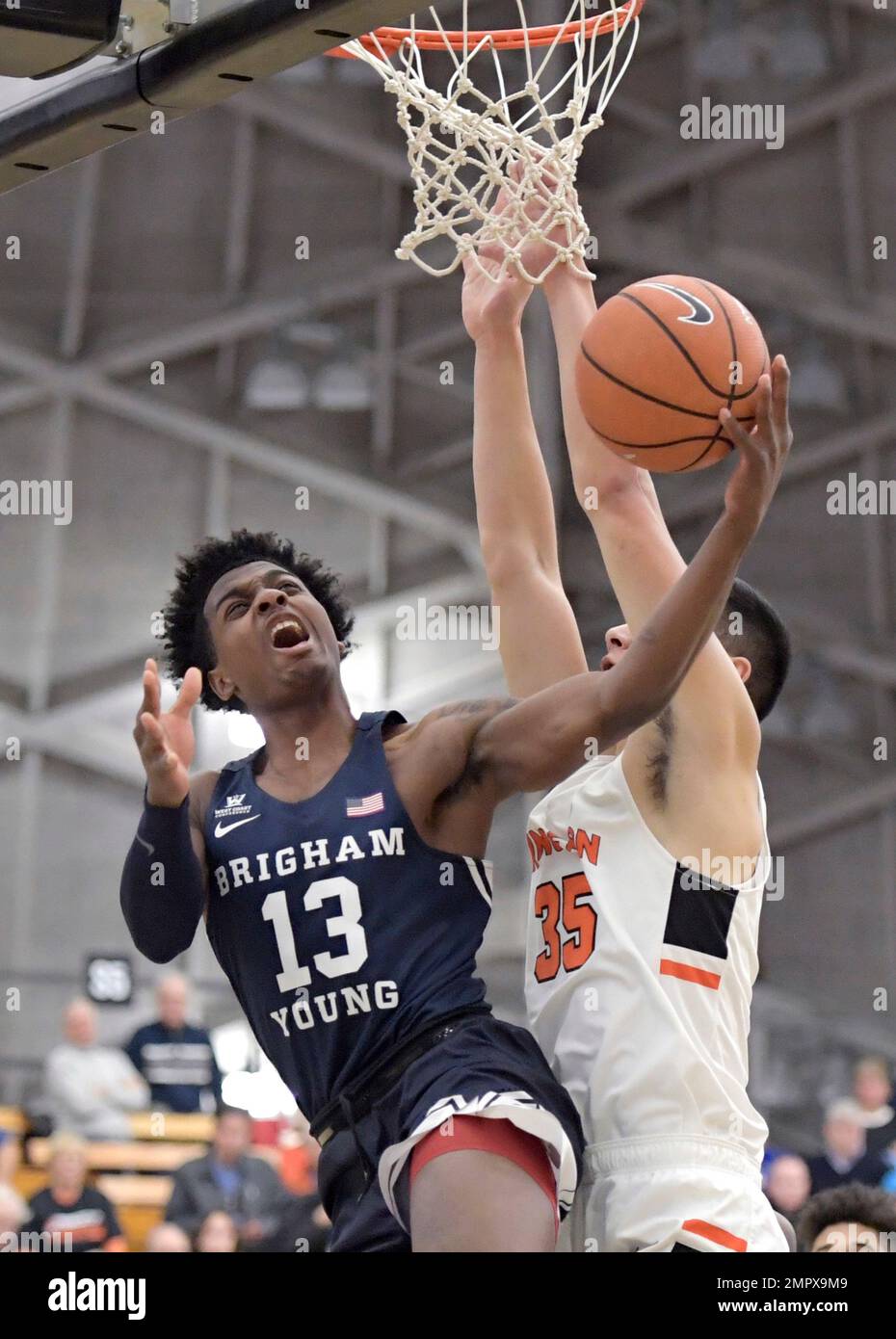 BYU guard Kajon Brown (13) goes up with a shot as he gets by Princeton ...