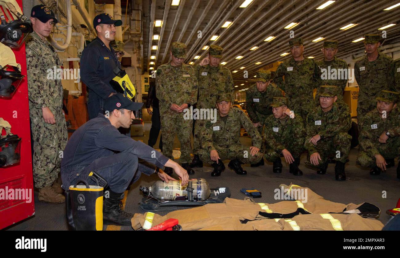 Damage Controlman 2nd Class Johnny Acevedo, assigned to the amphibious ...