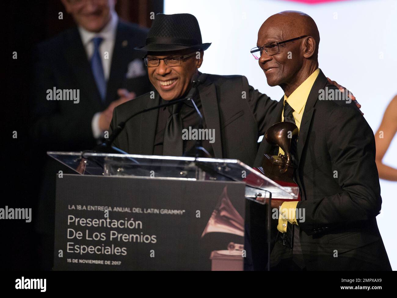 Ramon Orlando, left, stands with Cuco Valoy just after Valoy received ...
