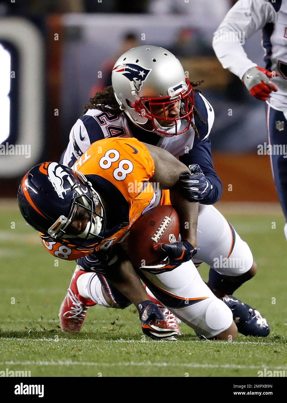 Denver Broncos wide receiver Demaryius Thomas (88) is tack;ed by New ...