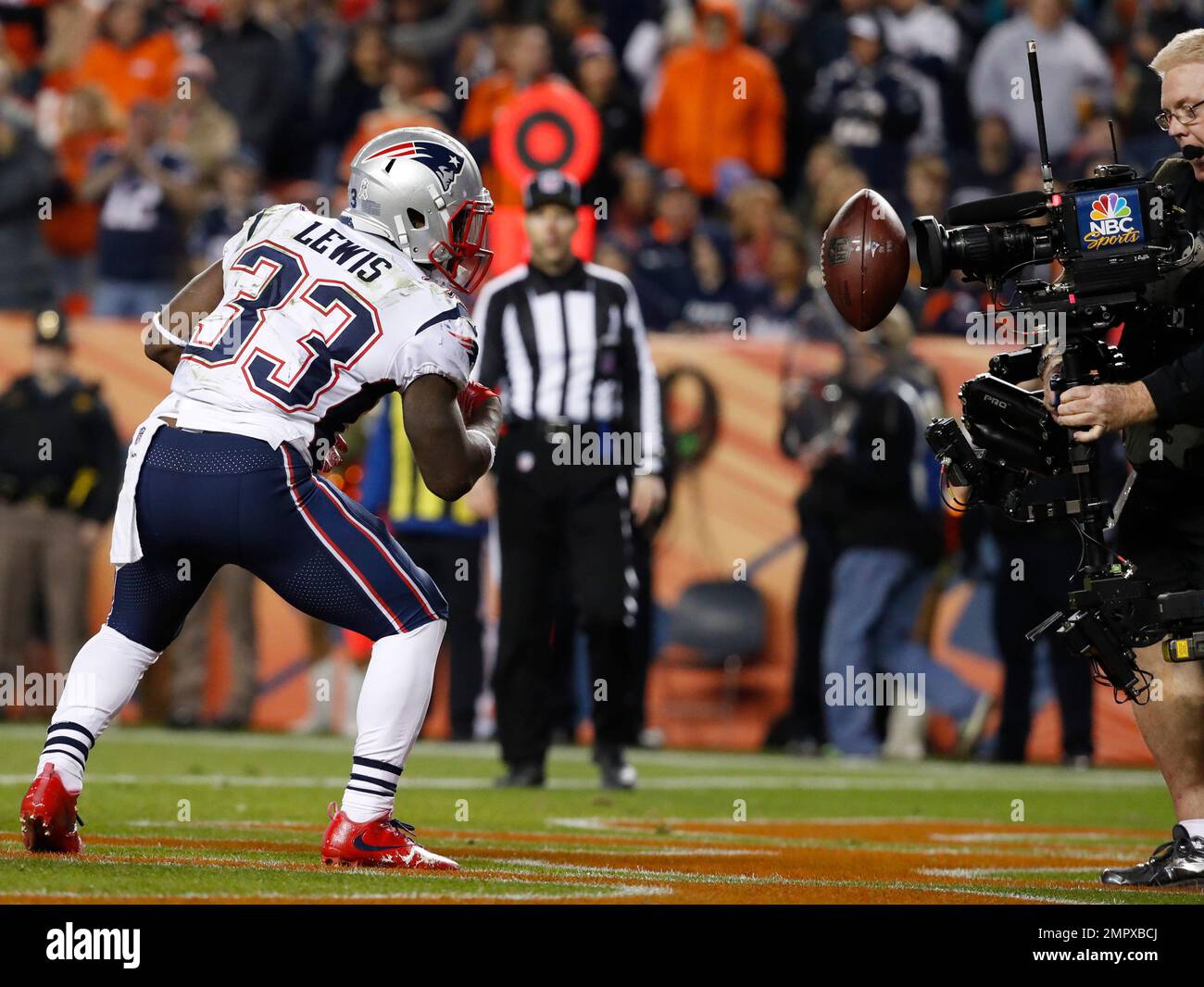 New England Patriots running back Dion Lewis tosses the football at the ...