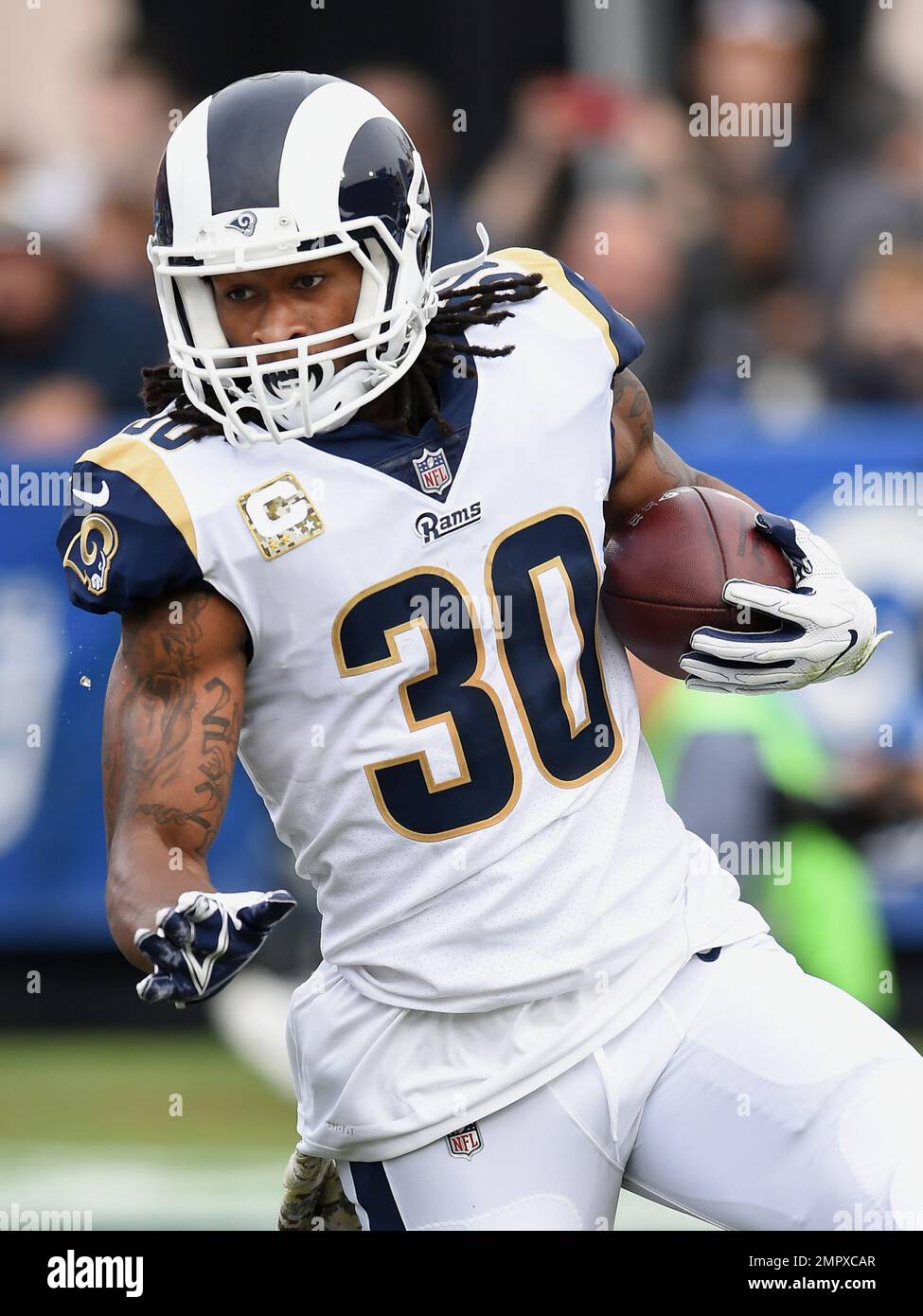 Los Angeles Rams running back Todd Gurley II (30) gains yards on a ...