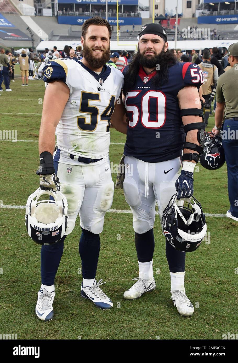 Los Angeles Rams linebacker Bryce Hager (54) and Houston Texans Ben ...