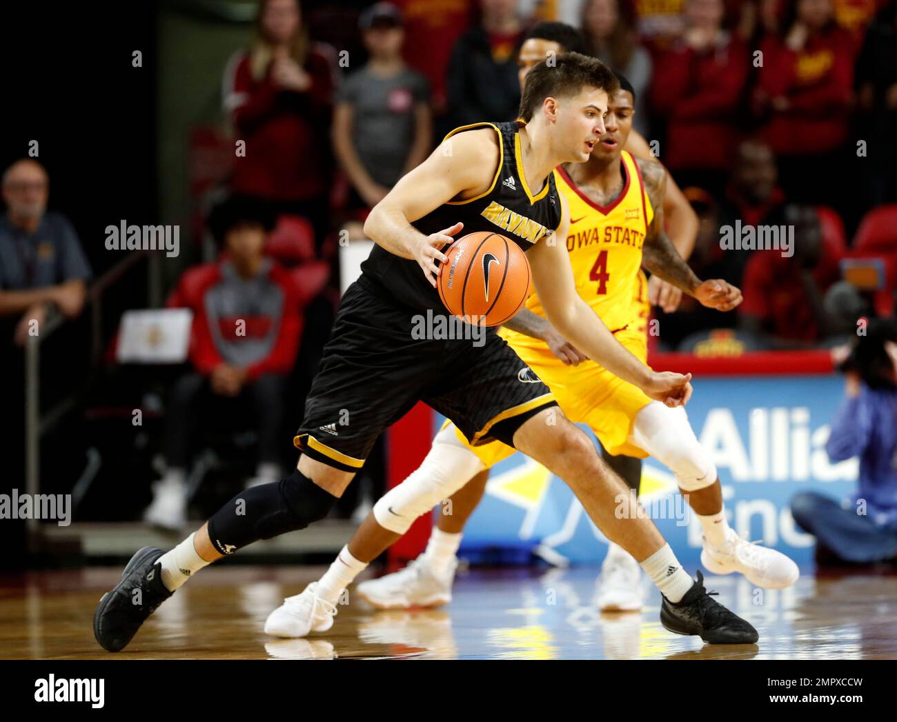 Milwaukee guard Brock Stull drives to the basket during the first half ...