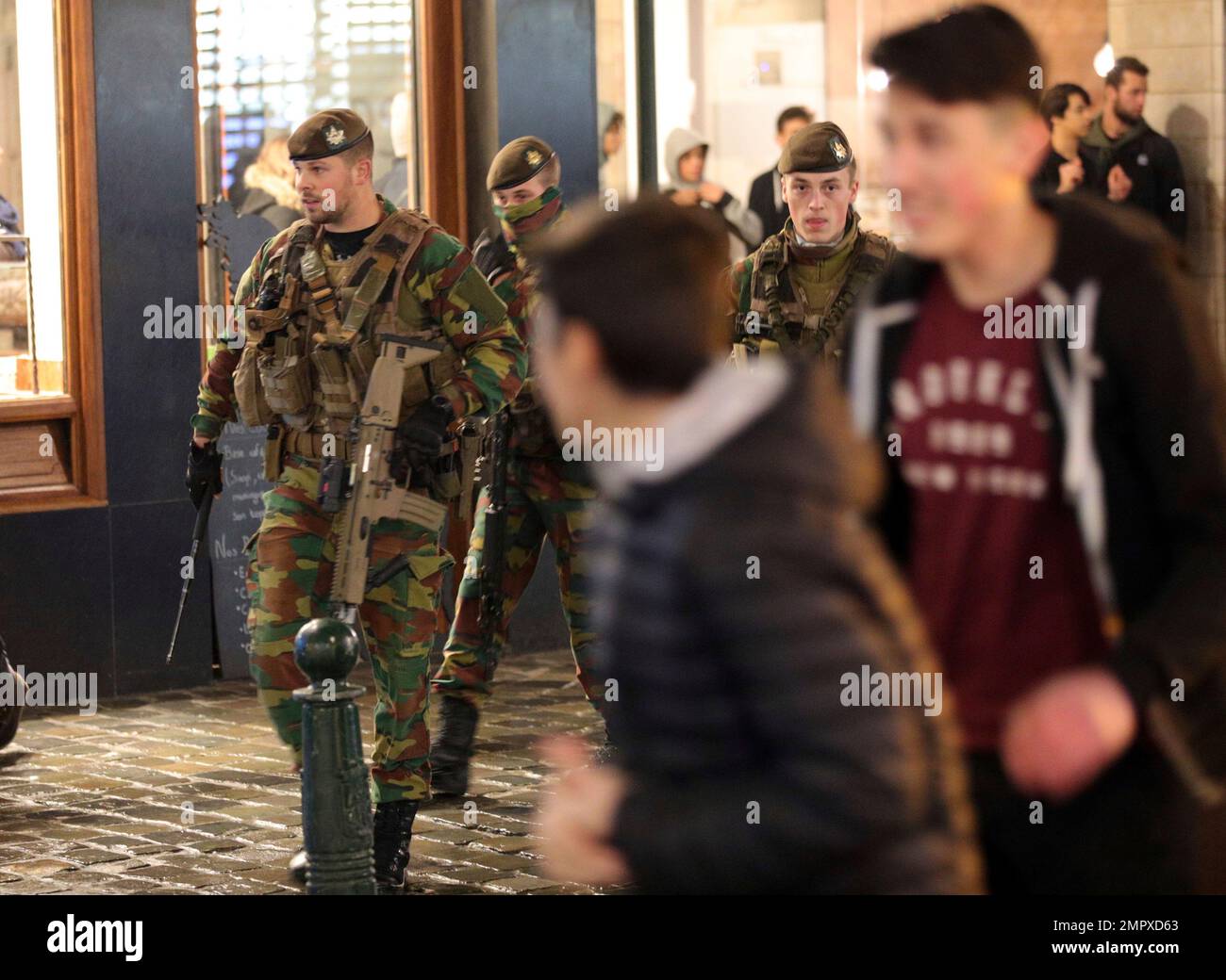 Belgian Army soldiers patrol during unrest in Brussels on Wednesday ...