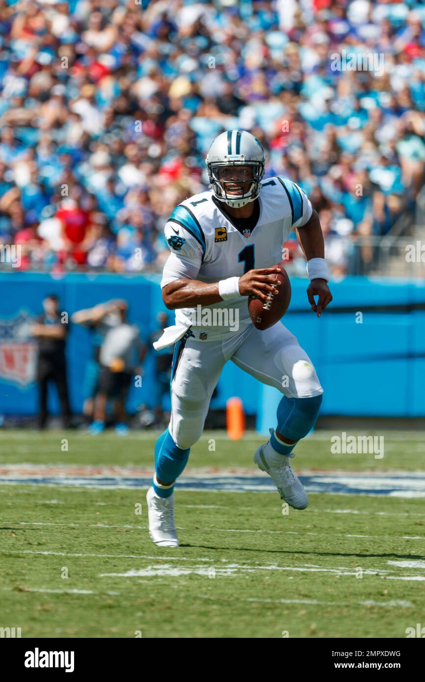 Carolina Panthers quarterback Cam Newton (1) scrambles out of the ...