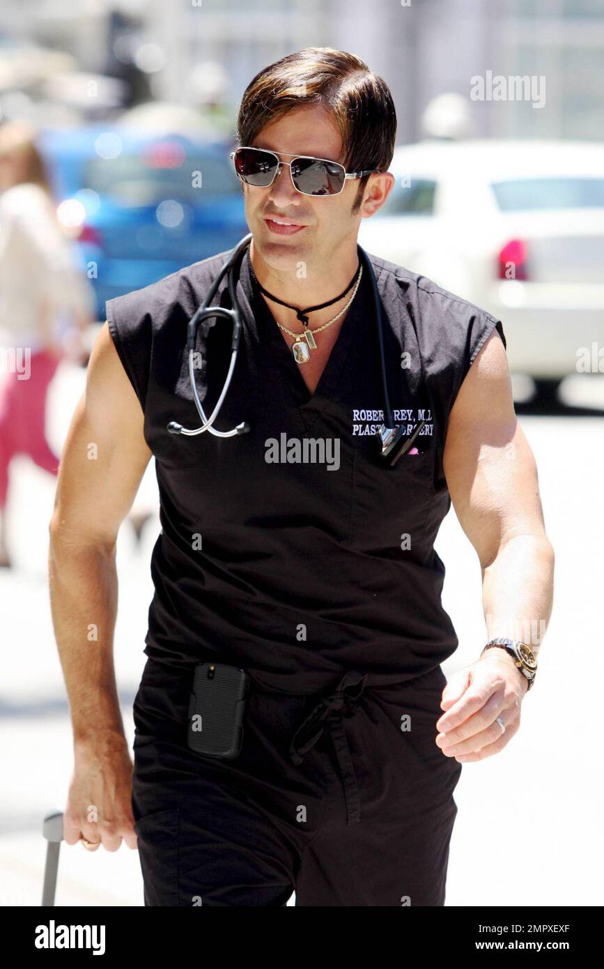 With a stethoscope around his neck, plastic surgeon Robert Rey (aka Dr ...