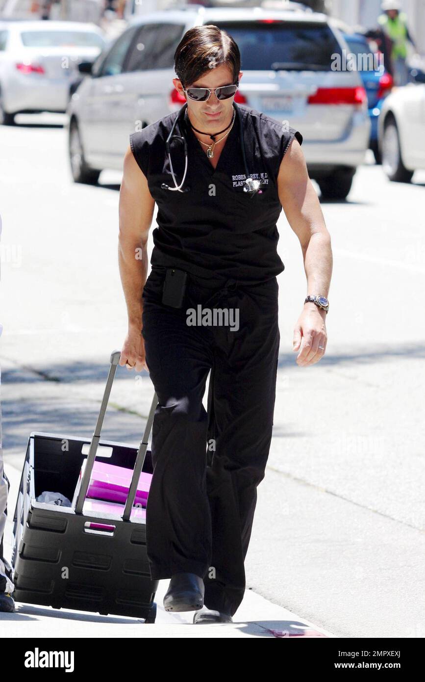 With a stethoscope around his neck, plastic surgeon Robert Rey (aka Dr ...