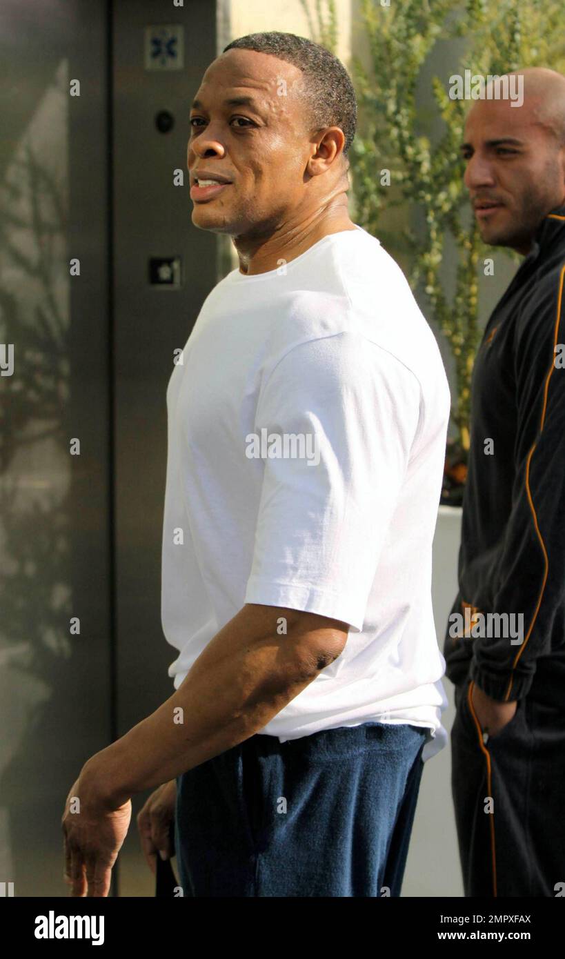 Rap music mogul Dr. Dre looks pumped up as he leaves the gym with a ...