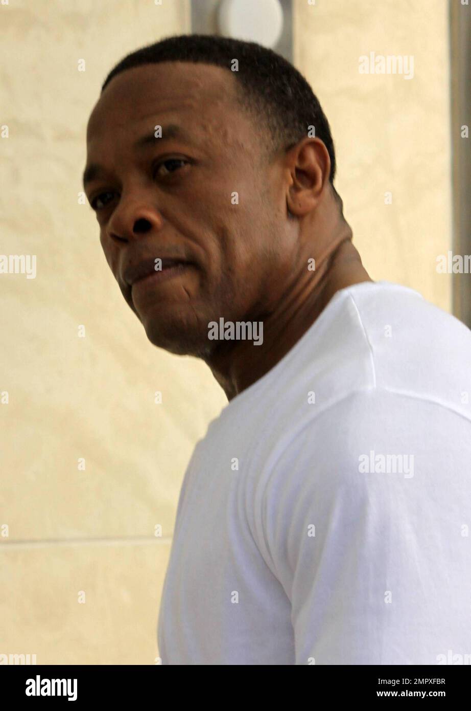 Rap music mogul Dr. Dre looks pumped up as he leaves the gym with a ...