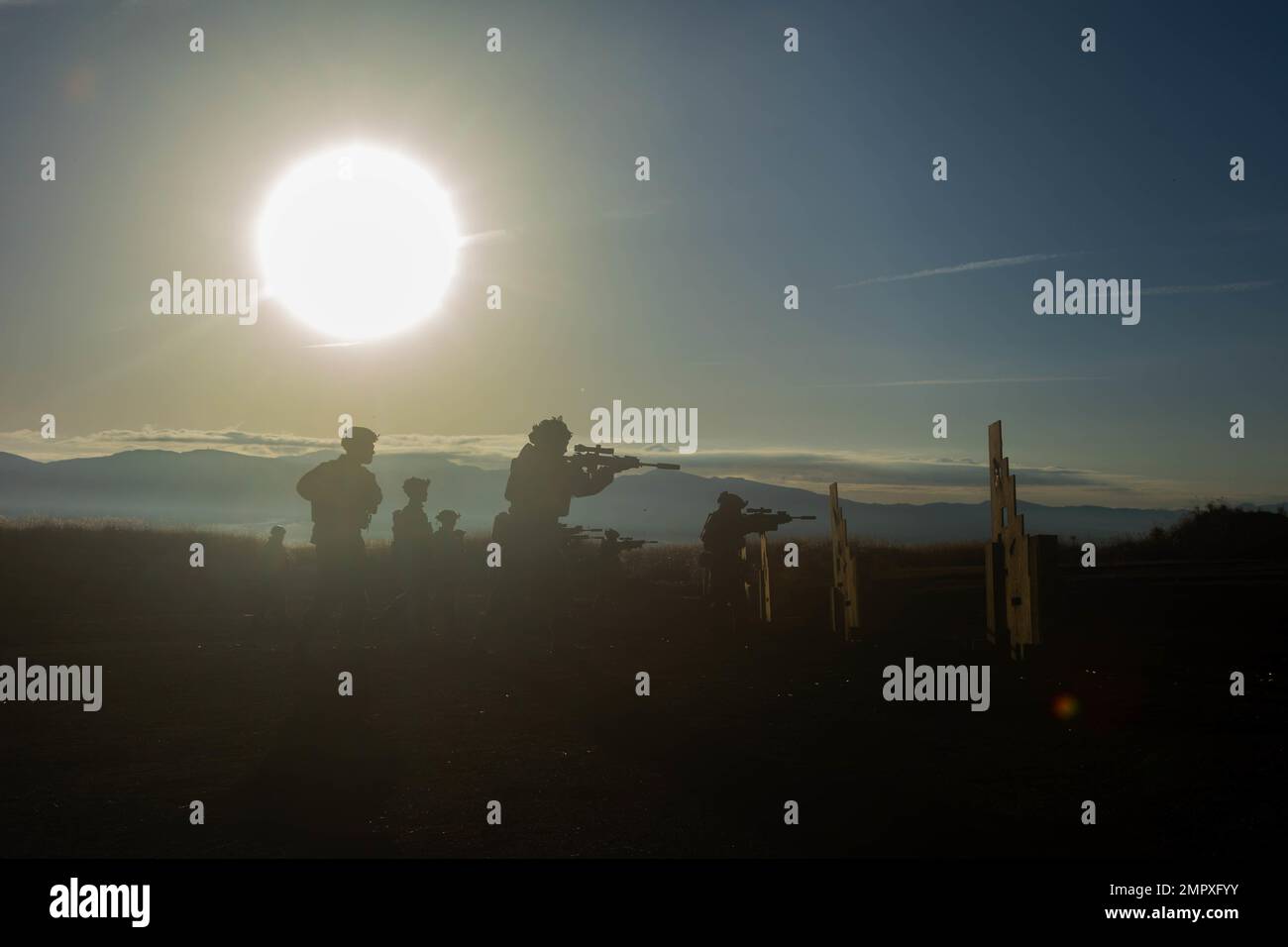 U.S. Marines with 1st Battalion, 2d Marines fire M27 Infantry Automatic ...