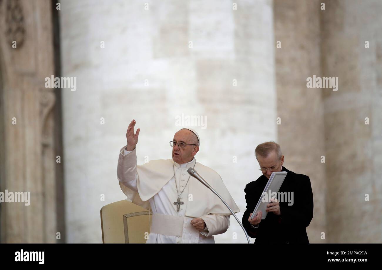 Pope Francis delivers his blessing during his weekly general audience ...