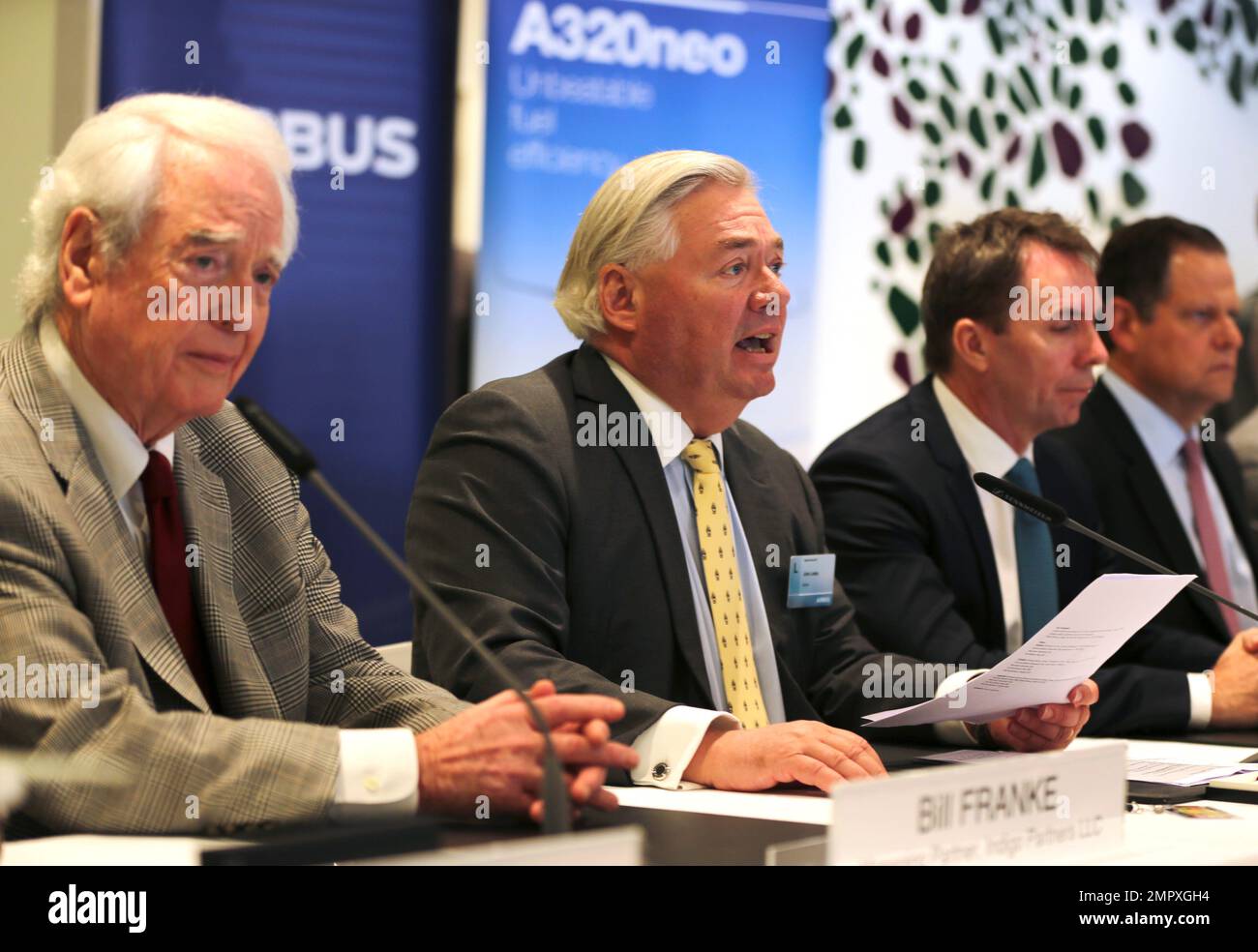 From left to right, Bill Franke, managing partner of Indigo Partners, John Leahy, chief ...