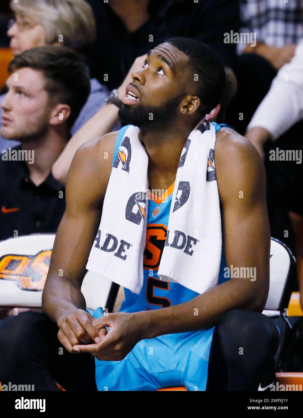 Oklahoma State guard Tavarius Shine looks up at the scoreboard during ...