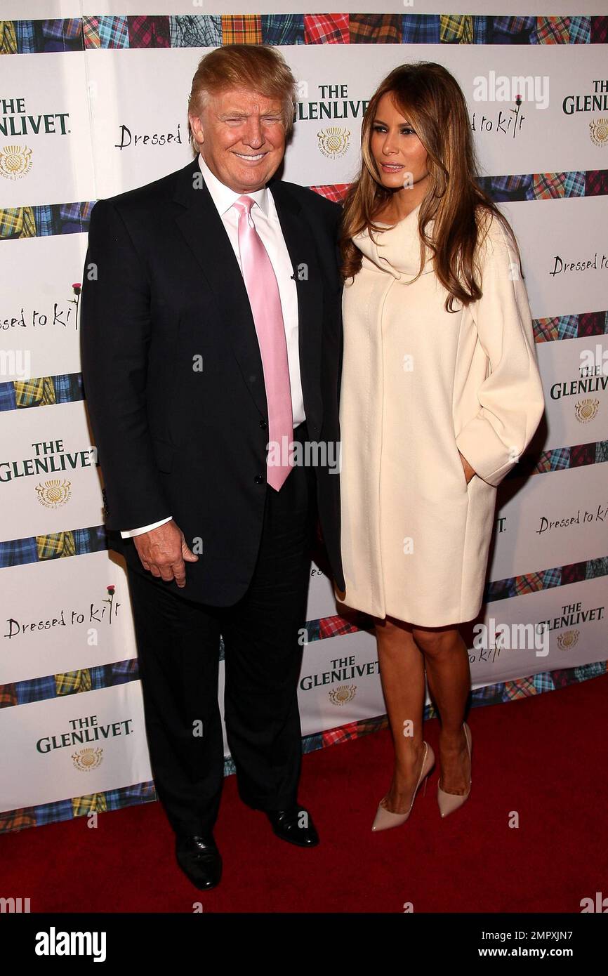 Donald Trump and Melania Trump pose for photographers at the 9th Annual ...