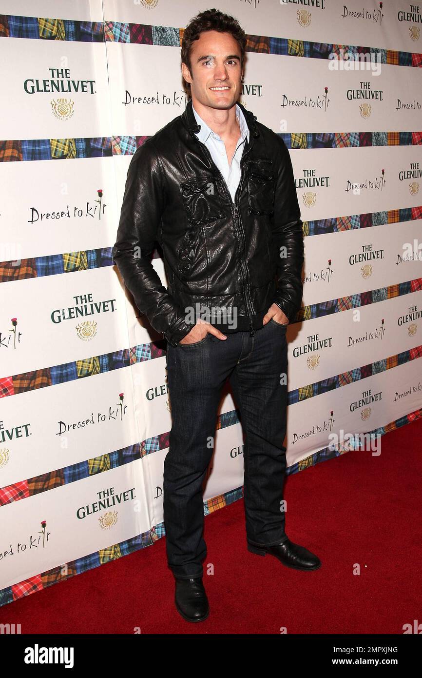 Former professional Ruby player Thom Evans poses for photographers at ...