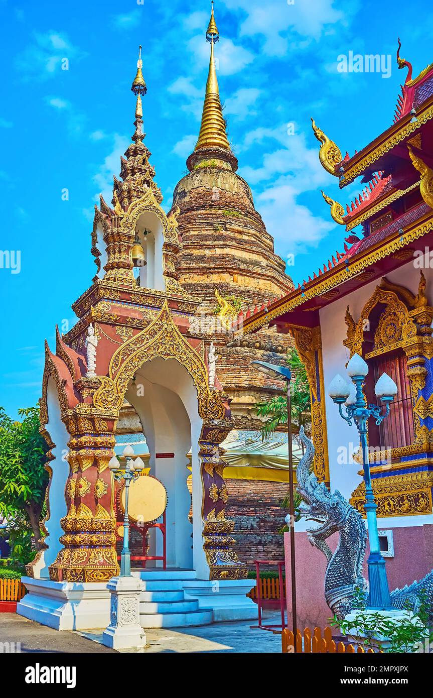 The sculptured stucco Ho Rakang belfry with ritual gong and bell in ...