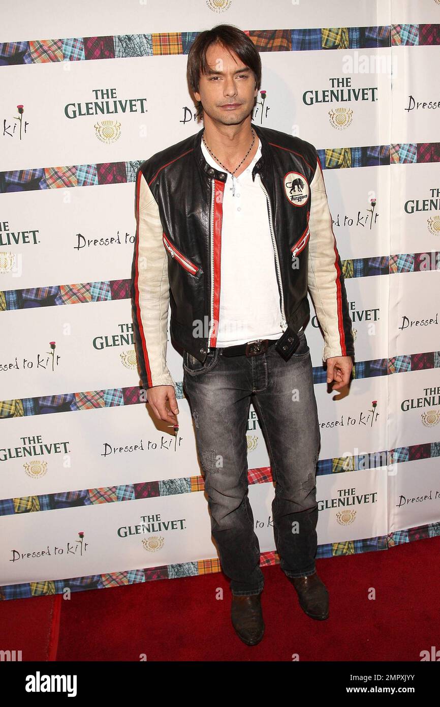 Marcus Shenkenberg poses for photographers at the 9th Annual 'Dressed ...