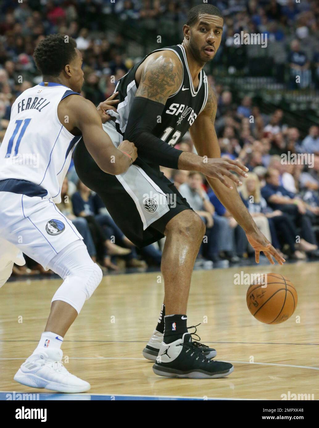 San Antonio Spurs forward LaMarcus Aldridge (12) dribbles against ...