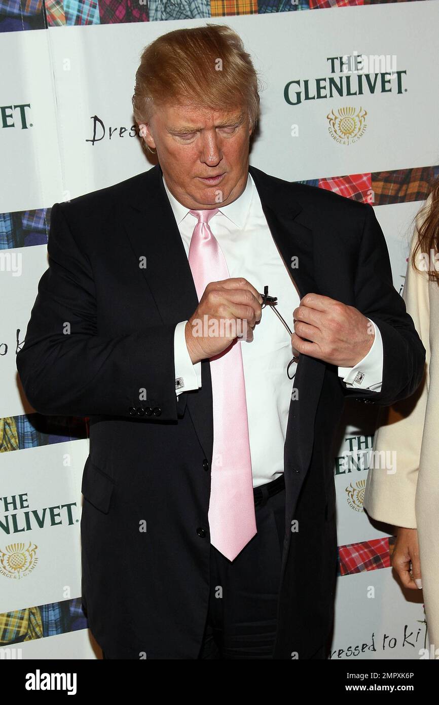 Donald Trump poses for photographers at the 9th Annual 'Dressed To Kilt ...