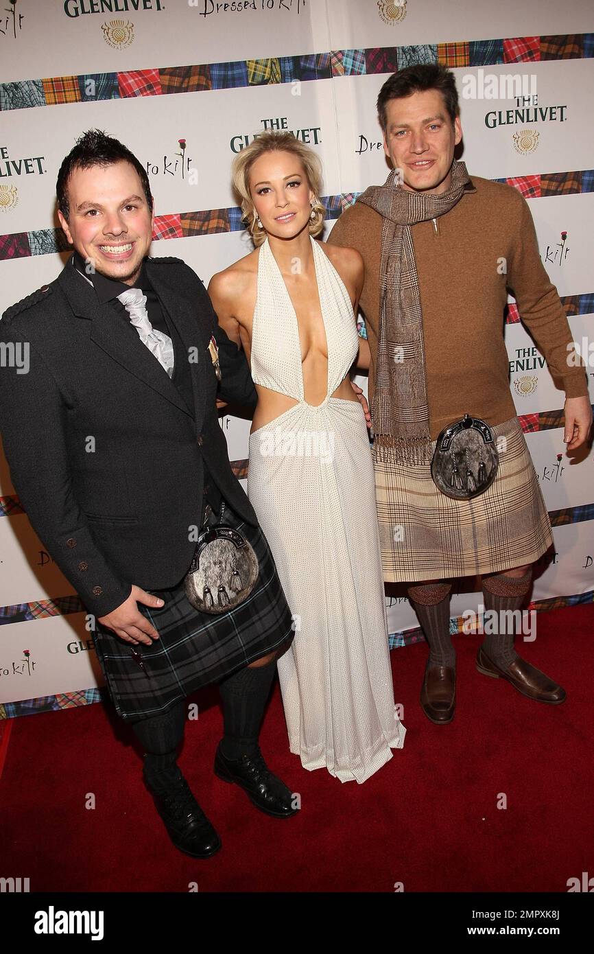 Paul Findlay, actress Louise Linton and Jim Paton pose for ...