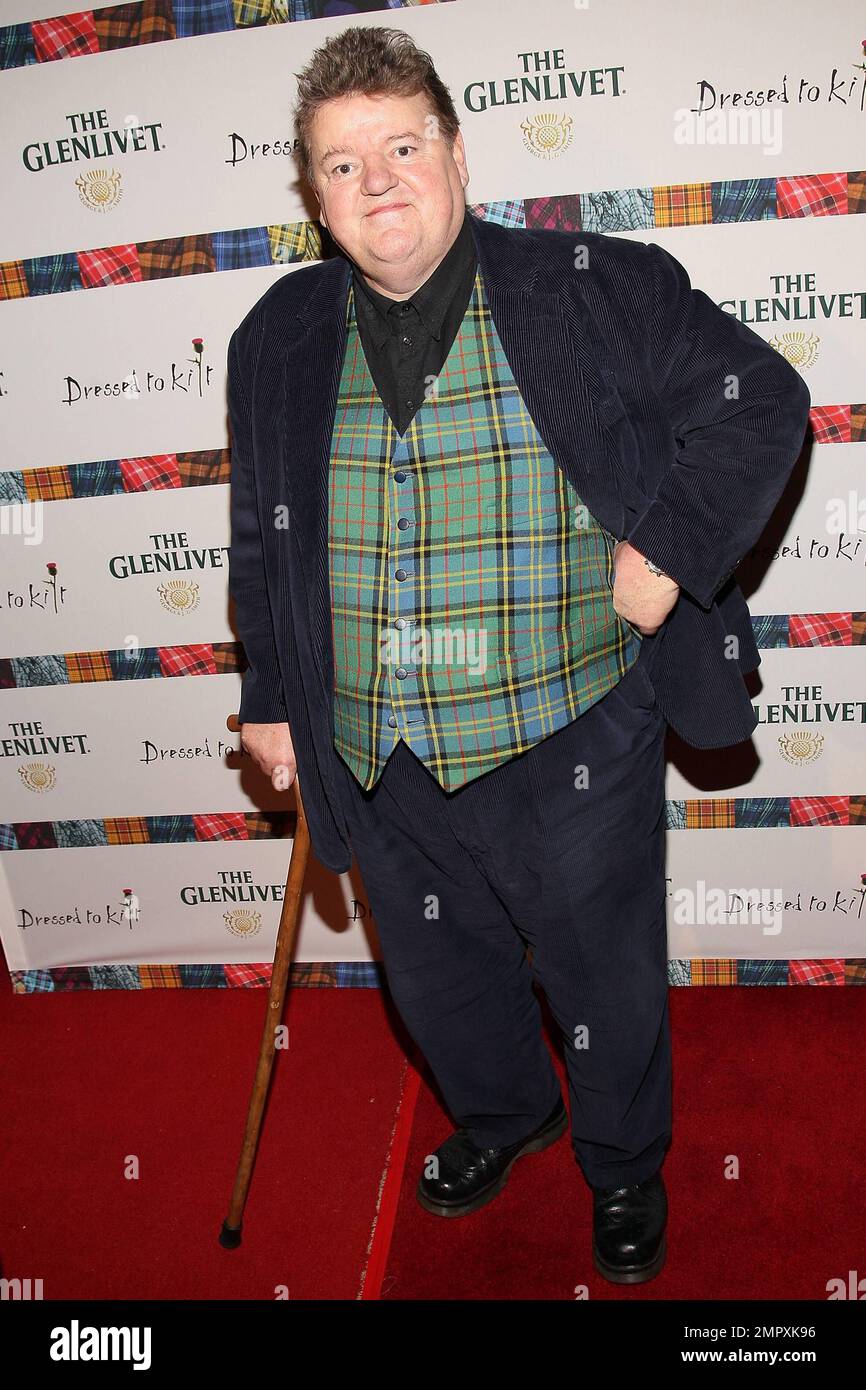 Actor Robbie Coltrane poses for photographers at the 9th Annual ...