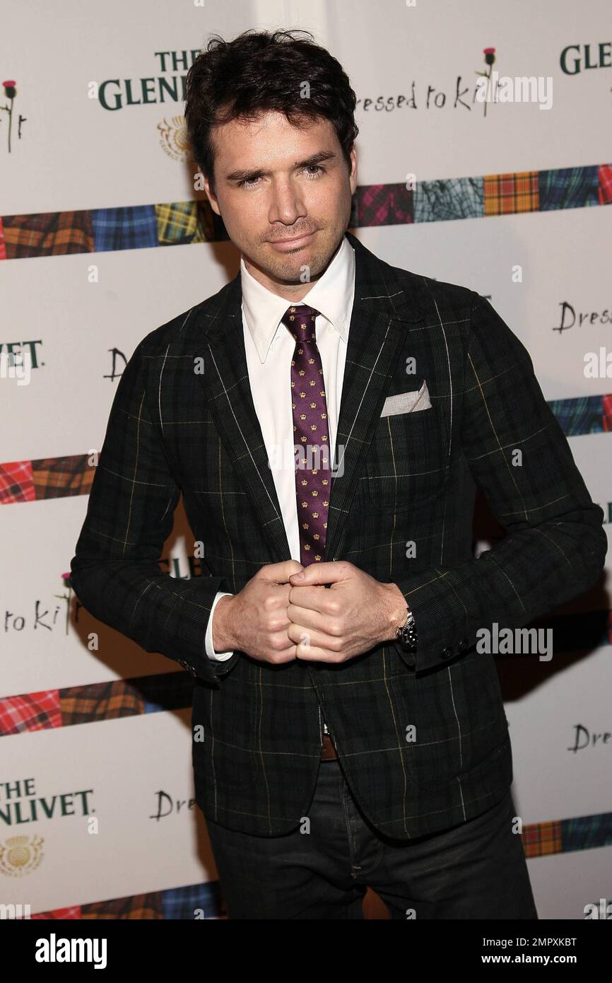 Actor Matthew Settle poses for photographers at the 9th Annual 'Dressed ...