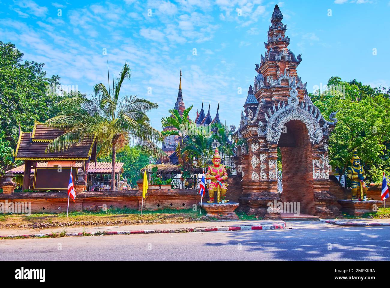 The brick gate of Wat Lok Moli, decorated with relief ornaments and ...